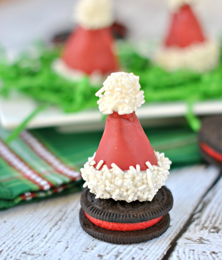 Adorable Santa Hat Oreo Balls | TheBestDessertRecipes.com